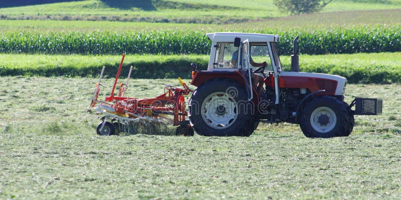 Tractor Hay Tedder Working Mountain Field Stock Photos - Free & Royalty ...