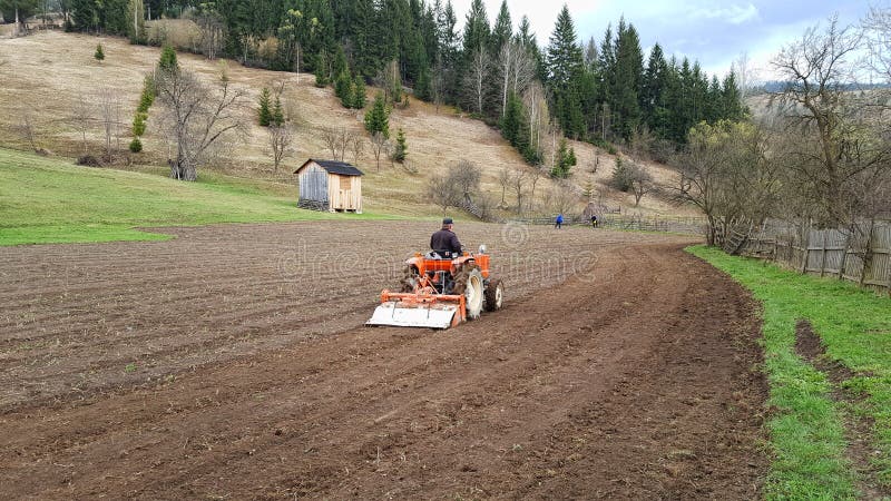 Tractor on the land editorial photography. Image of cultivated - 111988297