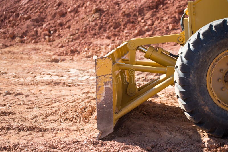 The Tractor is Leveling the Dirt Road Stock Photo - Image of building ...