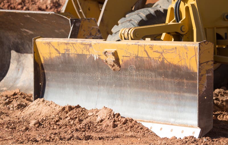 The Tractor is Leveling the Dirt Road Stock Image - Image of bulldozer ...