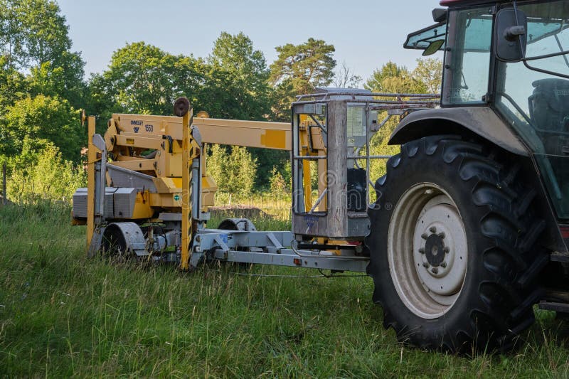 Tractor with Lifting Platform on the Trailer Hitch Stock Image - Image ...