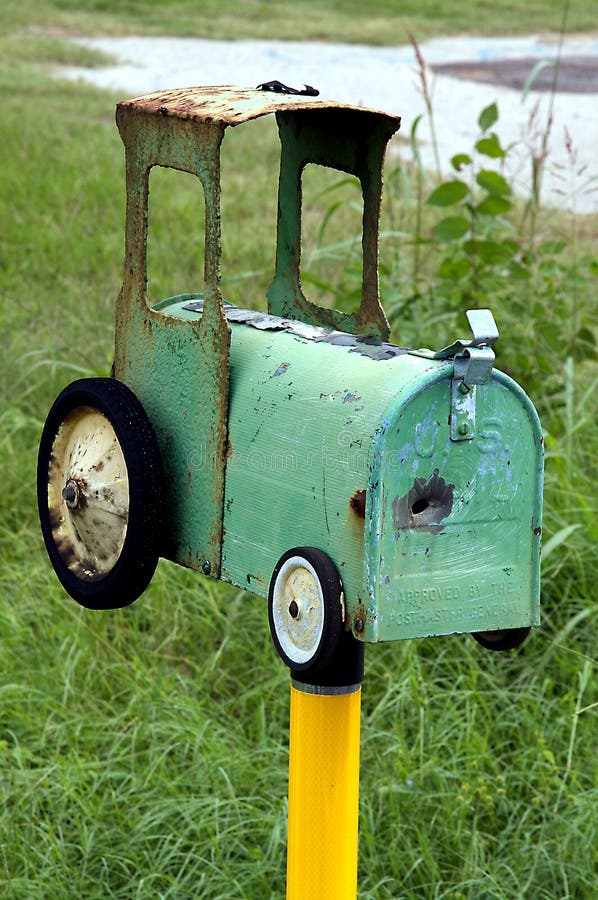 Tractor Mailbox with Bullet Hole Stock Image - Image of family, post ...