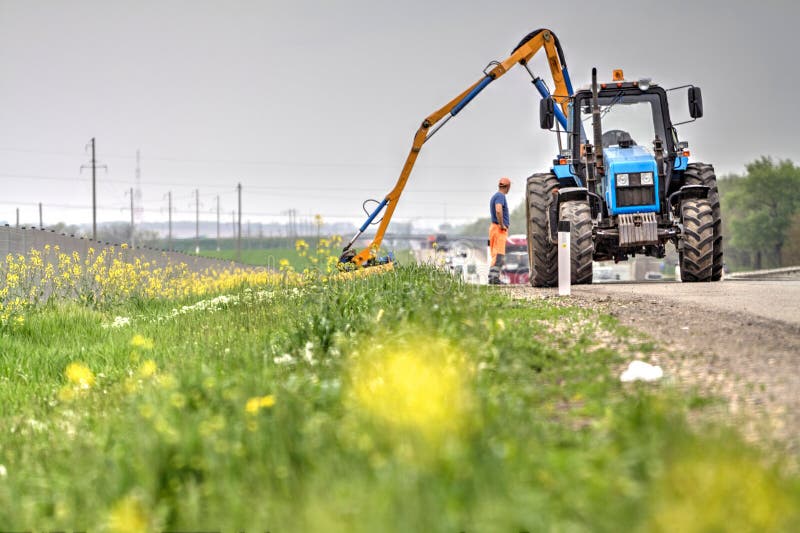 Tractor with a Mechanical Mower Mowing Grass Stock Image - Image of ...
