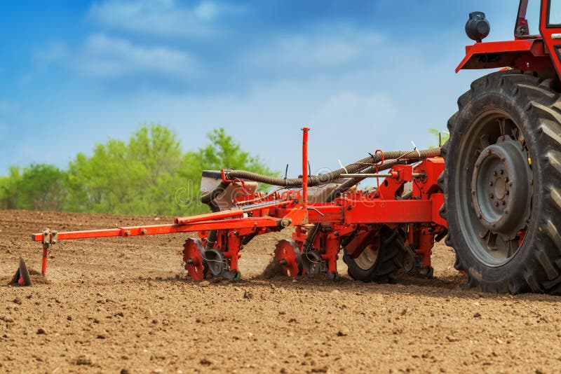 Tractor with Mounted Crop Seeder Stock Photo - Image of planting ...