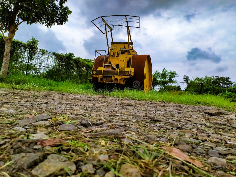 Tractor Park on Green Field Stock Image - Image of truck, yellow: 173907387