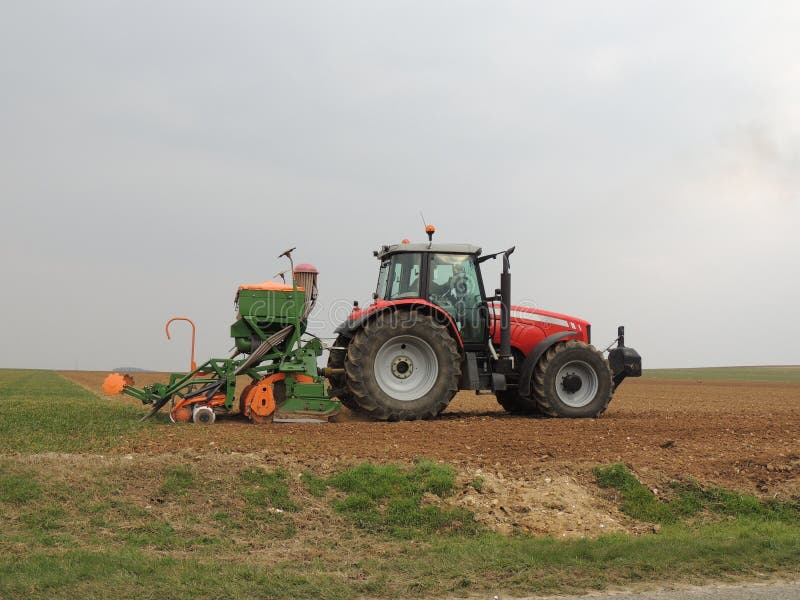 Tractor with planter stock photo. Image of spring, field - 31602462