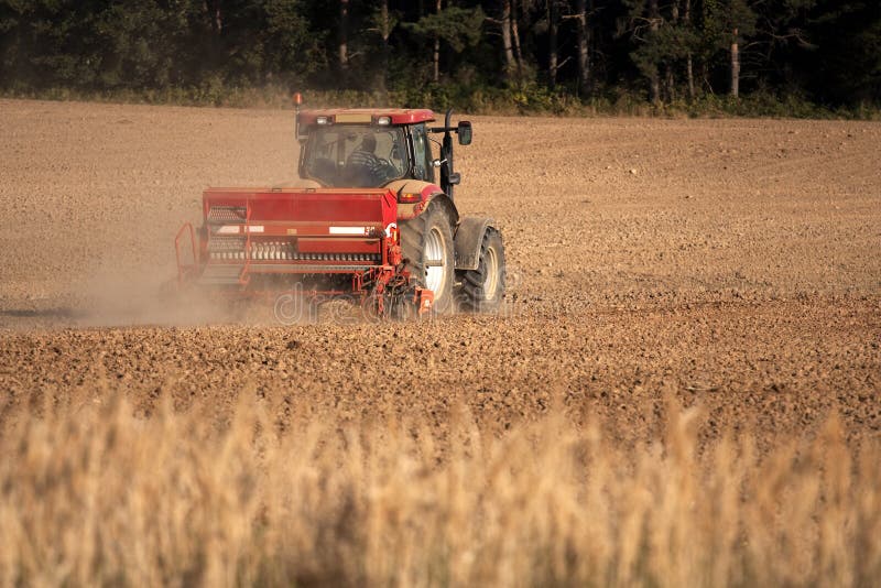 Tractor with plough stock photo. Image of furrow, plough - 11105078