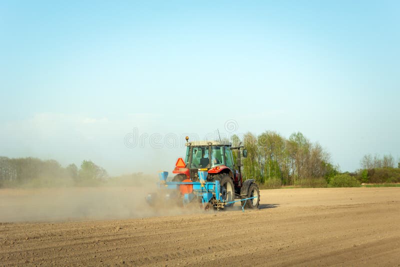 Tractor Ploughing the Field, Dust from Dry Soil Stock Image - Image of ...