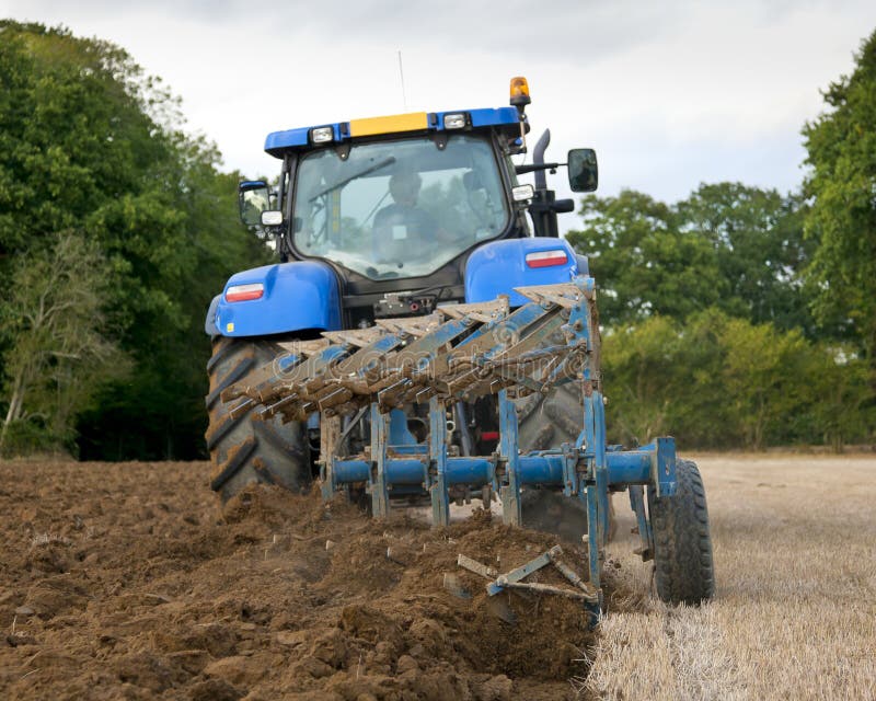 Tractor Ploughing Field stock photo. Image of machinery - 21254470