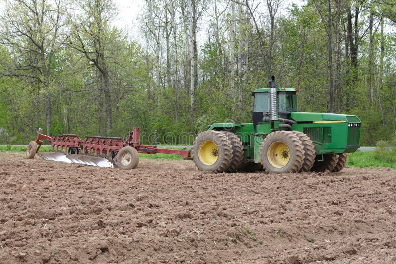 Tractor and Plow editorial photography. Image of farmer - 5200057