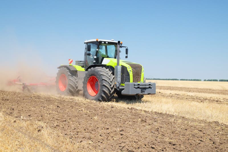 Tractor with a plow stock photo. Image of fertilizer - 43346952