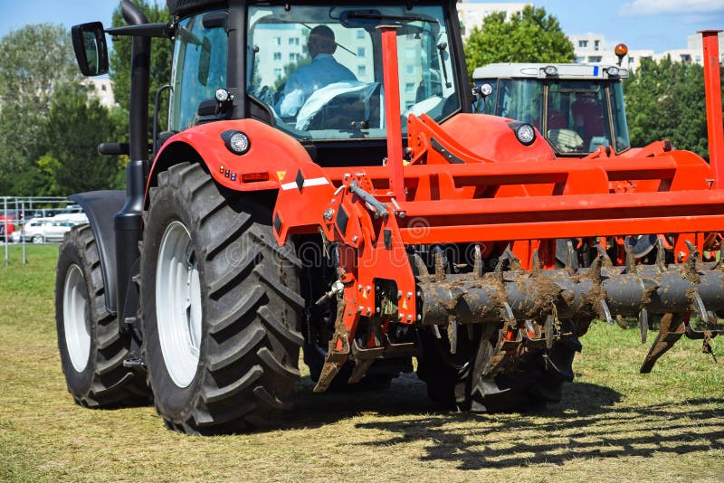 Tractor with Plow Machinery Stock Photo - Image of farm, tire: 61006334