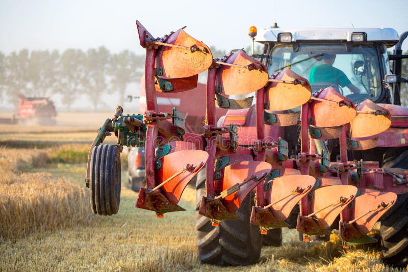 Tractor with Plowing Equipment Stock Photo - Image of equipment, grow ...