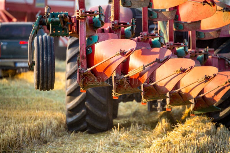 Tractor with Plowing Equipment Stock Photo - Image of nature, field ...