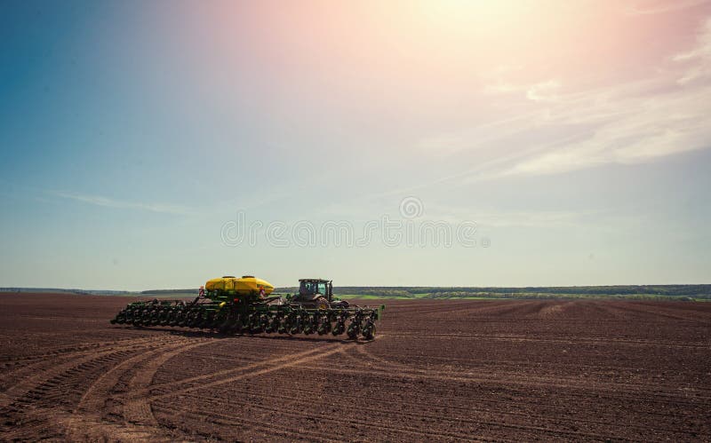 Tractor Plowing Farm Field in Preparation for Spring Planting Editorial ...