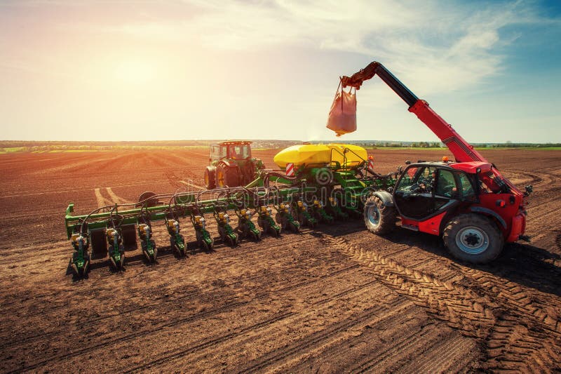 Tractor Plowing Farm Field in Preparation for Spring Planting Stock ...