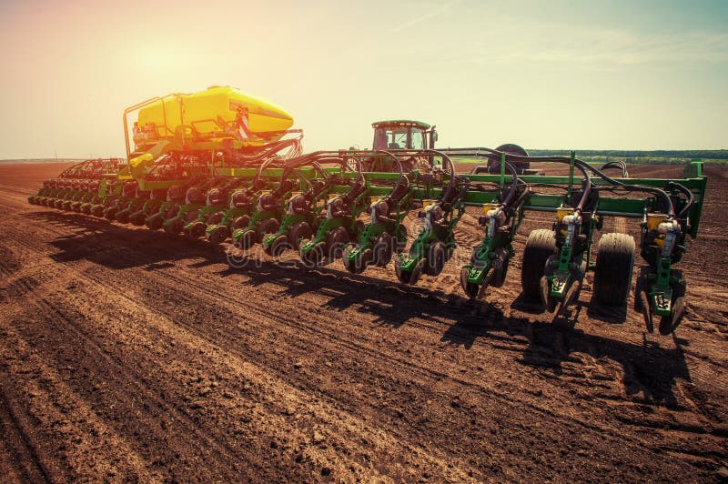 Tractor Plowing Farm Field in Preparation for Spring Planting Stock ...