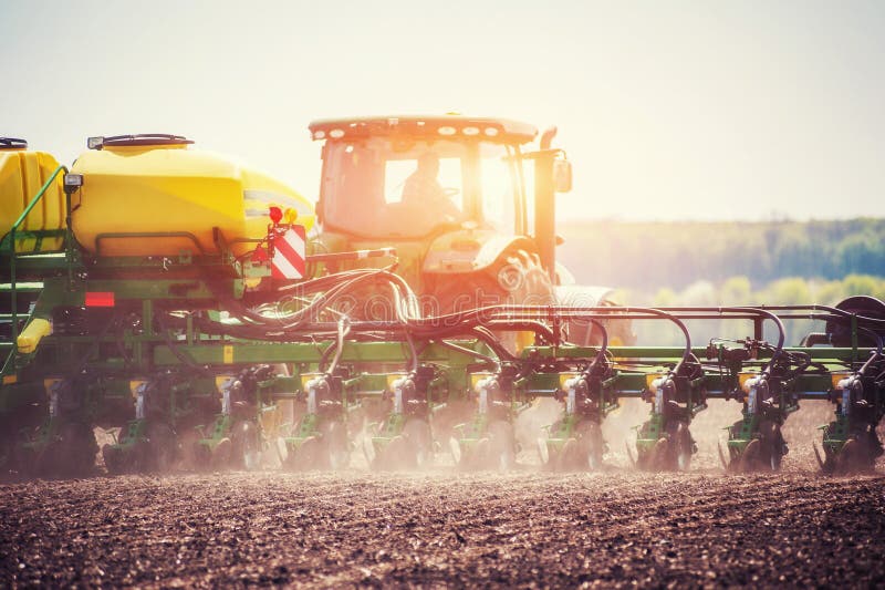 Tractor Plowing Farm Field in Preparation for Spring Planting Stock ...