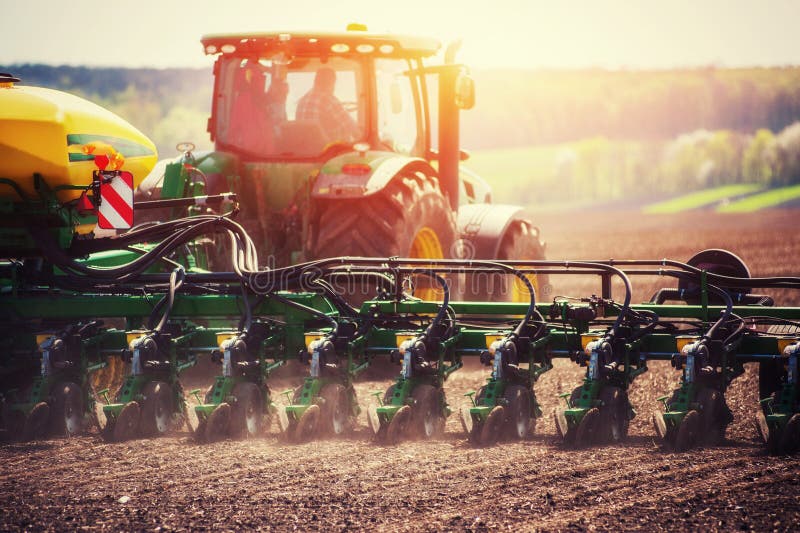 Tractor Plowing Farm Field in Preparation for Spring Planting Stock ...