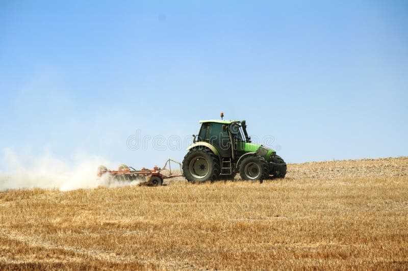 Tractor plowing field stock image. Image of harvest, agricultural ...
