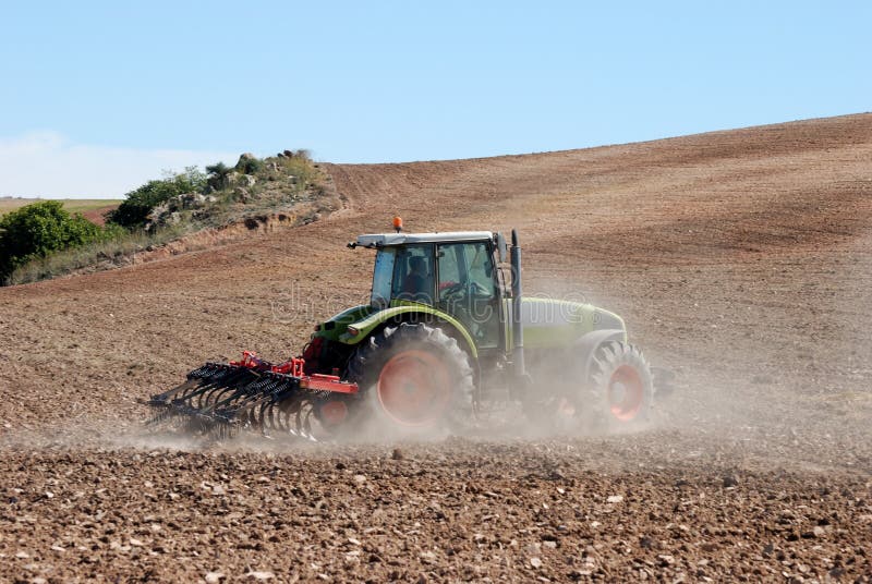Tractor plowing stock photo. Image of crops, crop, driving - 160766