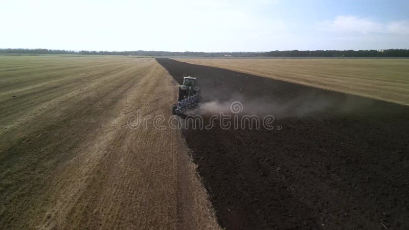 Tractor Plowing the Fields with Plow Stock Footage - Video of ...