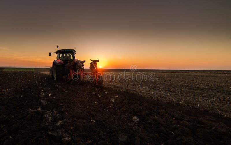 Tractor Plowing Fields -preparing Land for Sowing in Autumn Stock Photo ...