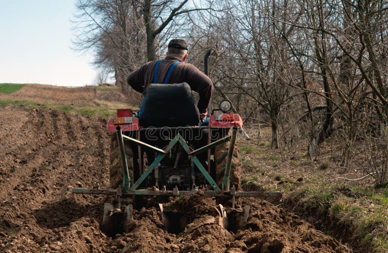 Tractor plowing stock photo. Image of cultivated, preparation - 50737512