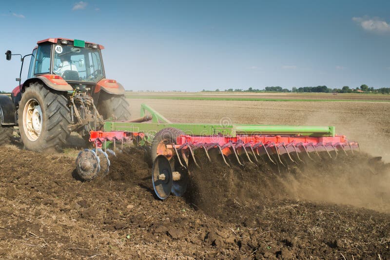 Tractor plowing stock image. Image of plowed, cultivate - 59919565
