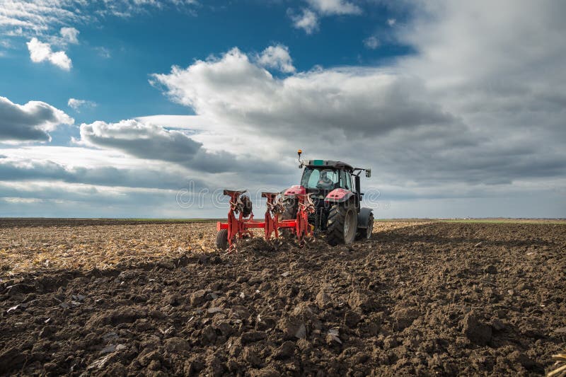Tractor Plowing stock photo. Image of cultivated, equipment - 51375118