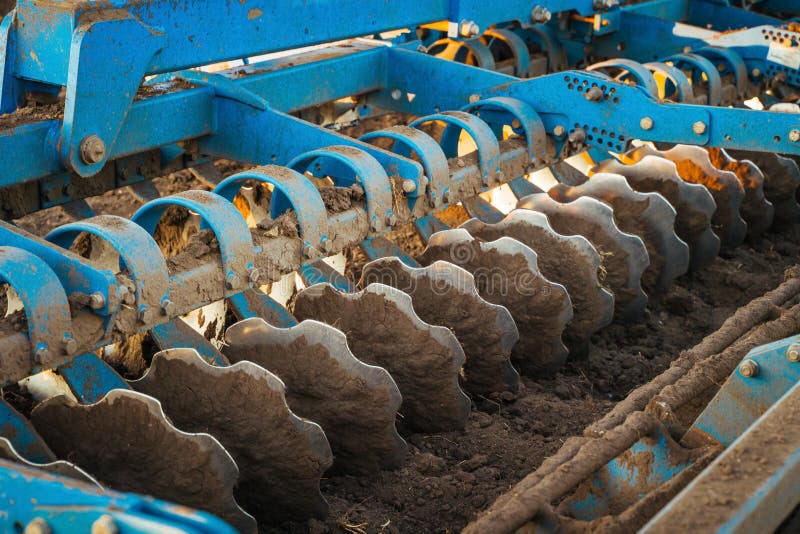 The Tractor Plows the Land. Agricultural Machinery, Plow Stock Image ...