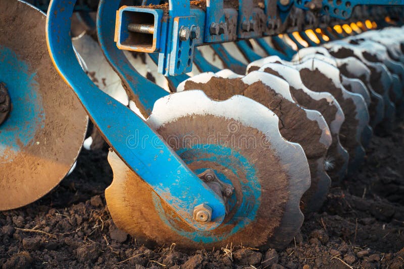 The Tractor Plows the Land. Agricultural Machinery, Plow Stock Photo ...