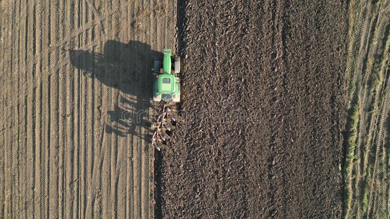 Tractor Plows Land in the Field Top View Stock Video - Video of country ...