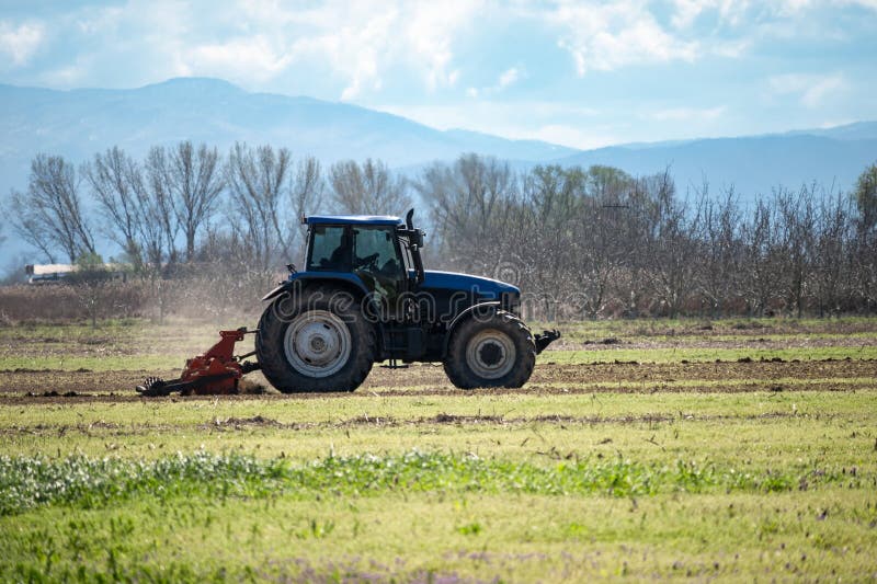Tractor Preparing the Fields Stock Photo - Image of soil, equipment ...