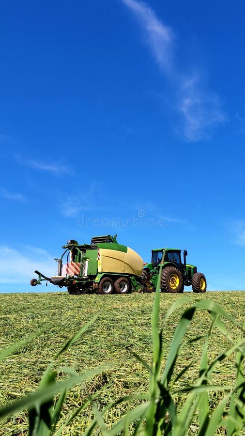 Tractor Preparing Ground Cover for Silage Stock Image - Image of ...