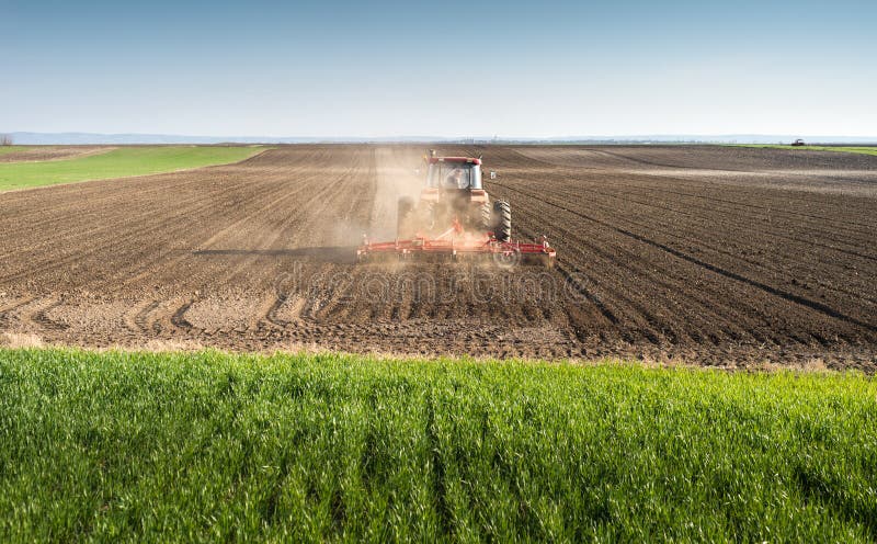 Tractor is Preparing the Land at Dusk Stock Photo - Image of effect ...