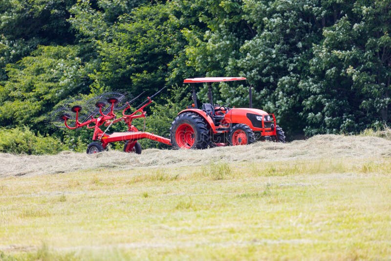 Tractor Pulling a Wheel Rake Stock Image - Image of farmland, circular ...