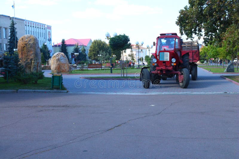 Tractor Removes garbage editorial stock image. Image of background ...