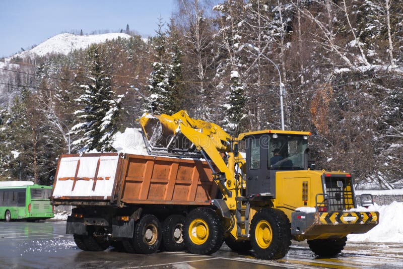 Tractor Removing Snow after Snowfall. Winter Season. Snow Clearing ...