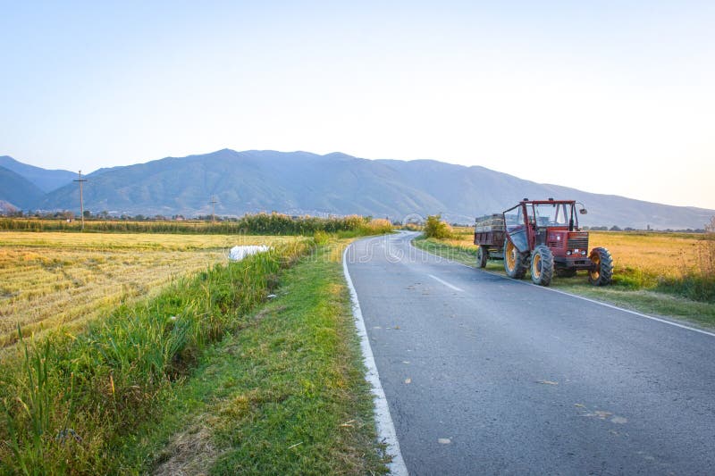 Tractor on the Road in the Countryside Editorial Photography - Image of ...