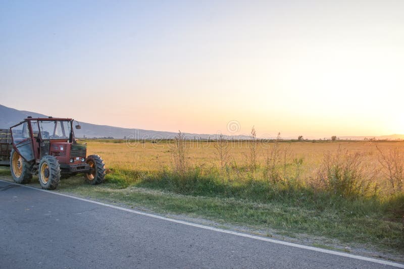 Tractor on the Road in the Countryside Editorial Stock Image - Image of ...