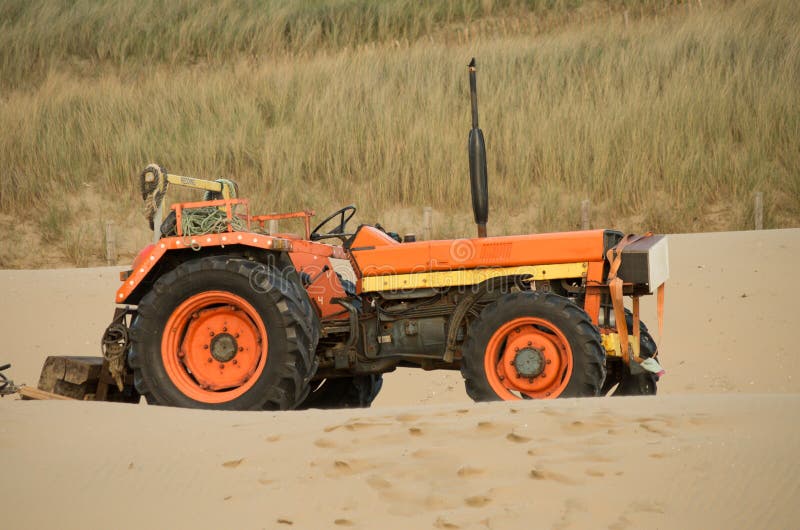 Tractor in sand dunes stock photo. Image of tillage, tilth - 46709328