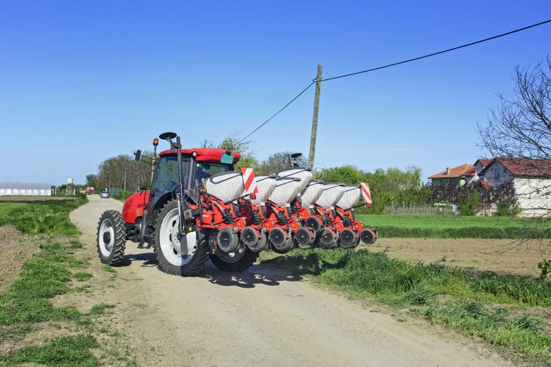 Tractor with Seeder on the Road Stock Image - Image of grain, agronomy ...