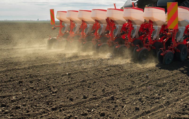 Tractor and Seeder for Sowing Corn Stock Image - Image of sowing ...