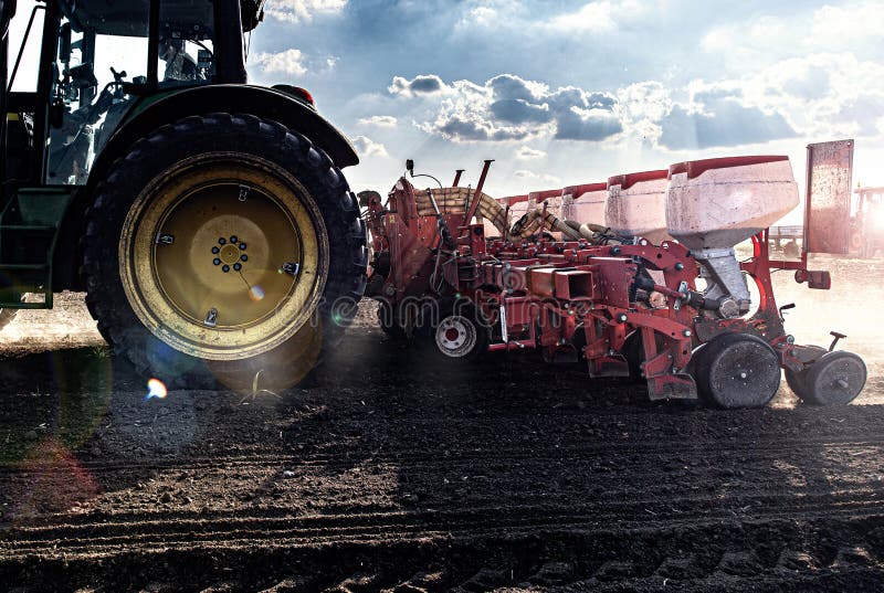 Tractor and Seeder for Sowing Corn Stock Image - Image of maize, work ...