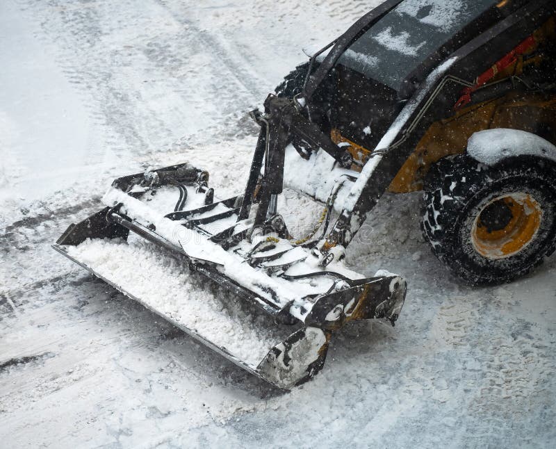 Tractor shoveling snow stock photo. Image of cold, machine - 300250394