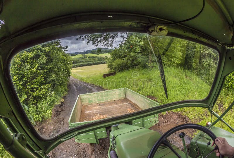 Tractor on a Small Road between Fields Stock Image - Image of farmer ...