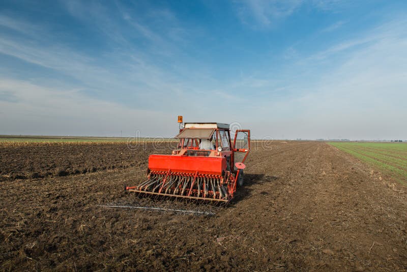 Tractor Sowing Seeds and Field Stock Photo - Image of country, spring ...