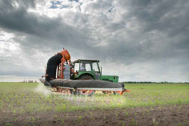 Tractor Spraying Pesticides Stock Photo - Image of sprayer, scene: 42851720