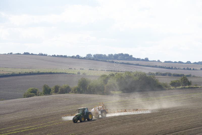 Tractor Spraying Field stock photo. Image of equipment - 9388000